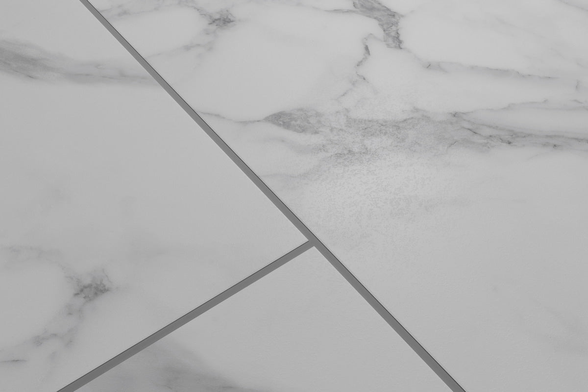 Audacity Rigid Core Pre-Grout Click Vinyl White Marble Tile Built-in U